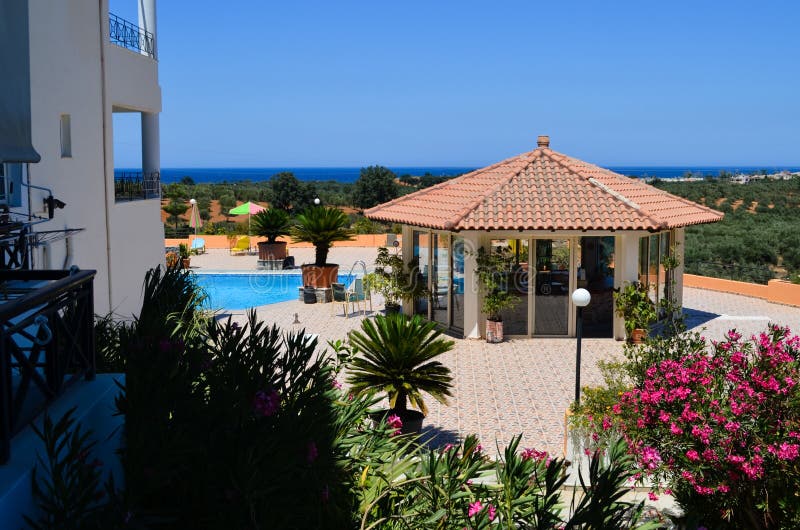 Vacation resort pool area stock image. Image of floral - 43647347