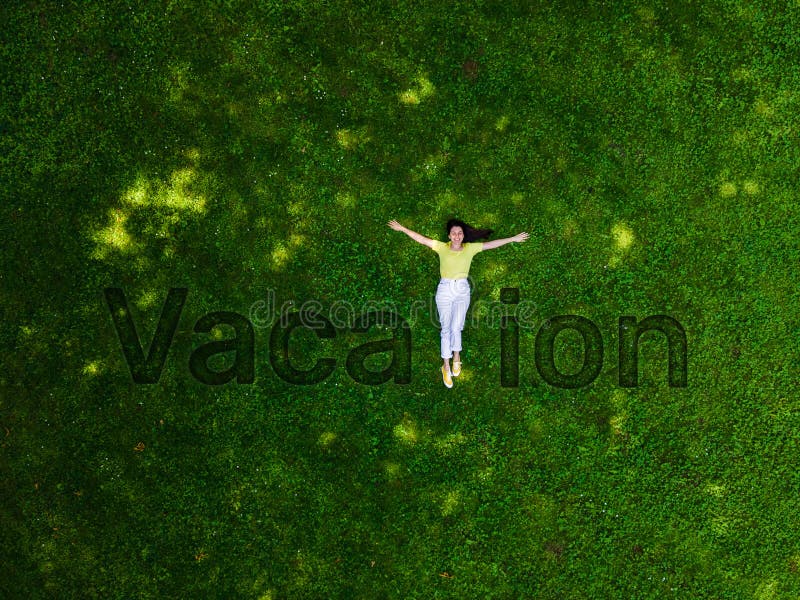 Vacation Text on the Ground Woman Lying Down As T Letter Stock Image ...