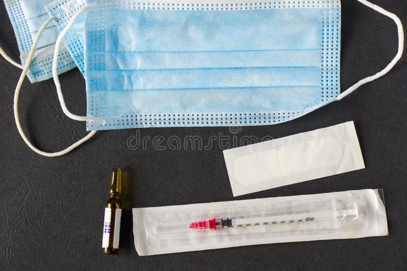 Vaccine Ampule, Needle and Medical Face Mask Stock Photo - Image of ...
