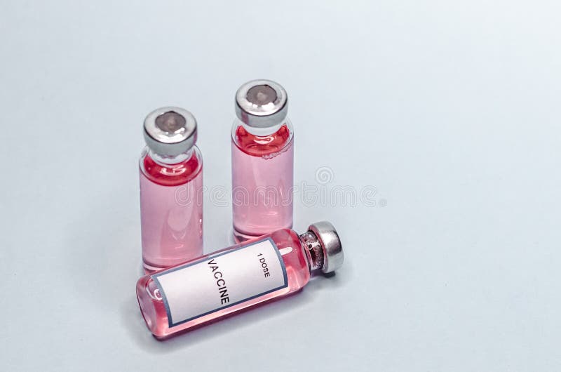 Vaccine in Glass Bottles on a White Background. Three Vials with One ...