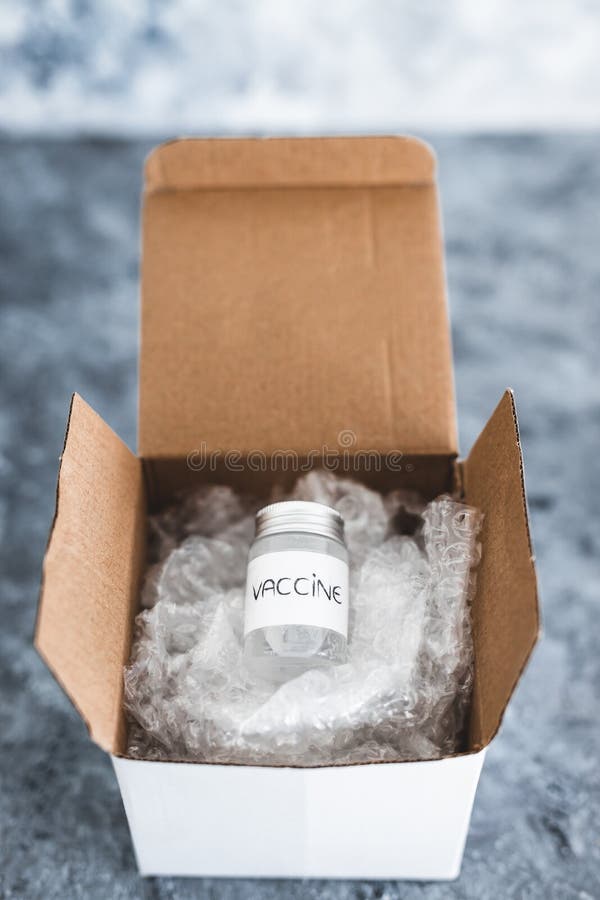 Vaccine Supply and Eligibility, Vaccine Vial Inside of Delivery Box ...