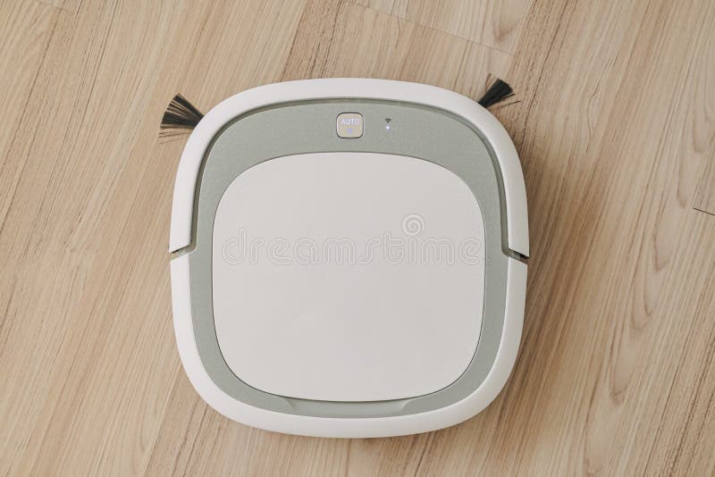 Vacuum Cleaner Bot is Working on the Floor of the Apartment. Stock ...