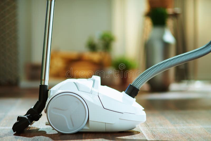 Vacuum Cleaner on Floor in Modern House Stock Photo - Image of ...