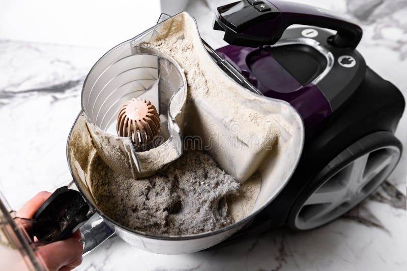 Vacuum Cleaner Full of Garbage after Home Cleaning. Stock Photo - Image ...