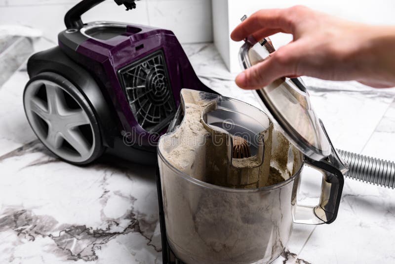 Vacuum Cleaner Full of Garbage after Home Cleaning. Stock Photo - Image ...