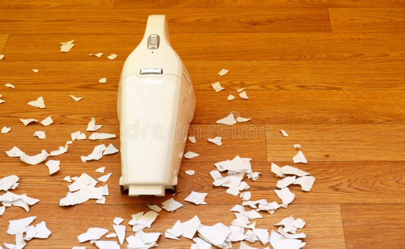 Vacuum Cleaner and Pieces Paper Stock Photo - Image of background ...