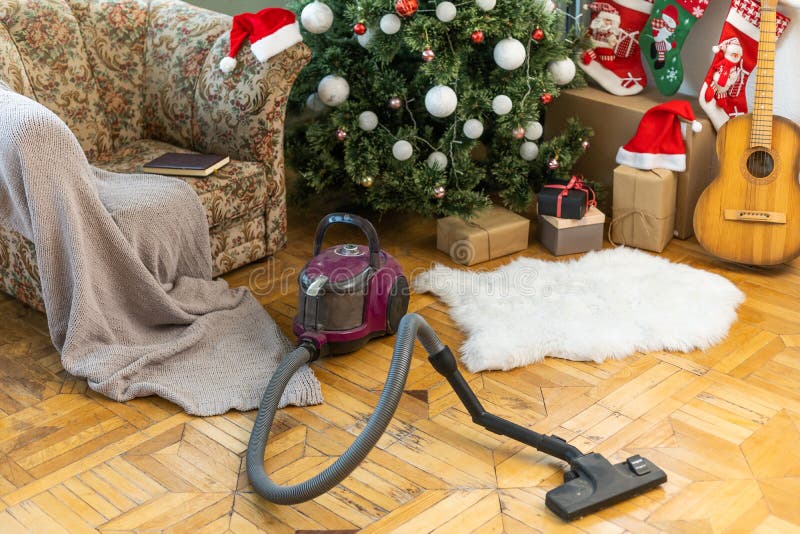 Vacuum Cleaning the Christmas Tree Needles Stock Photo - Image of base ...