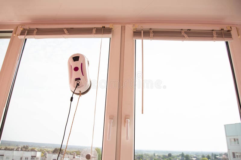 Vacuum Glass Washer Robot Washes Pvc Frame, Modern Device. Copy Space ...