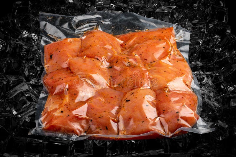 Vacuum-packed Meat, on Dark Ice Background, Chicken Fillet ...