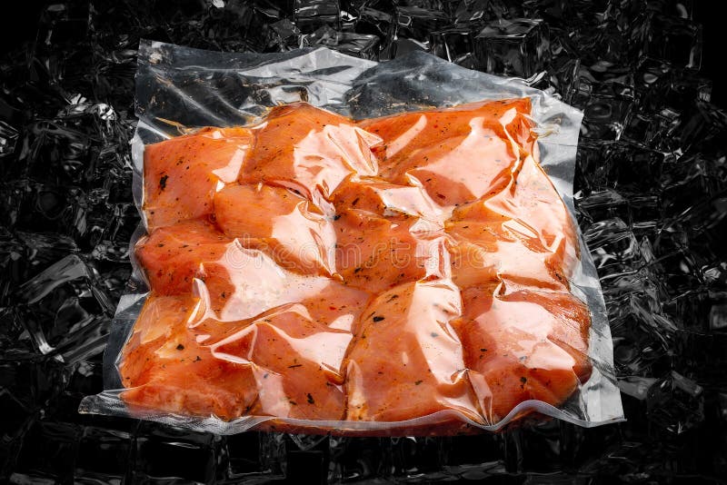 Vacuum-packed Meat, on Dark Ice Background, Chicken Fillet ...
