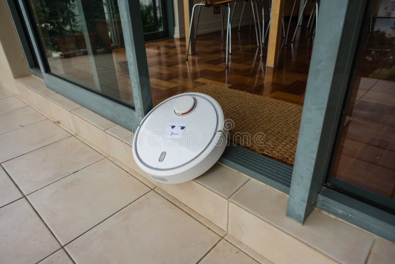 Vacuum Robot Falling Out the Door Stock Image - Image of face, falling ...