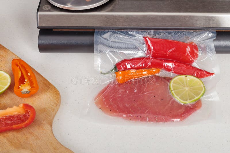 Vacuum Sealed Beef with Chili Peppers and Lime Stock Photo - Image of ...