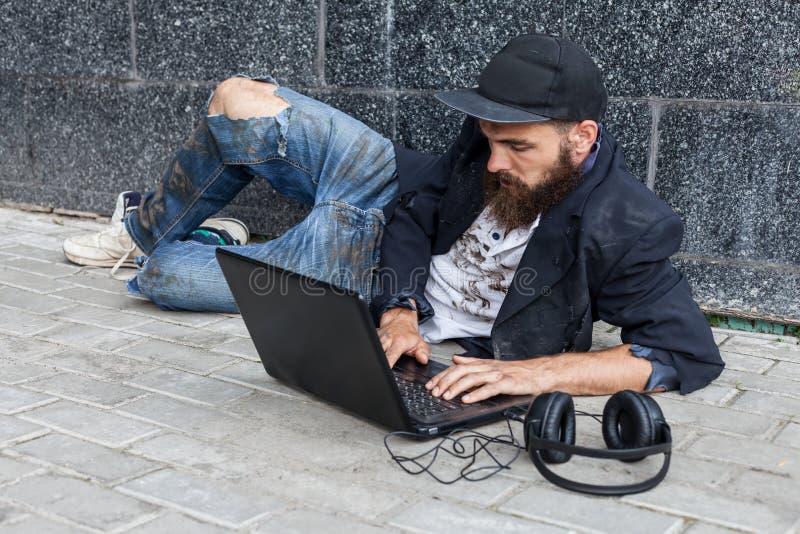 Vagrant with computer stock photo. Image of portrait - 76421516