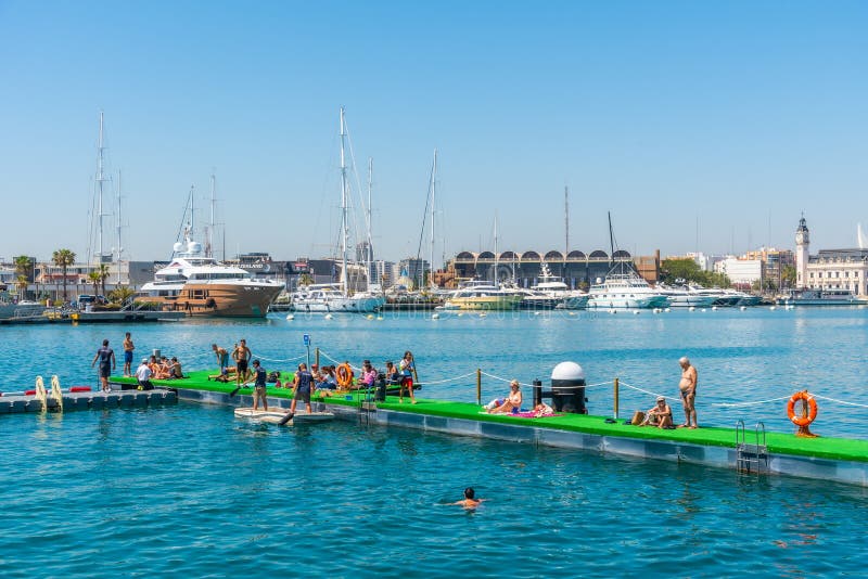 VALENCIA, SPAIN, JUNE 17, 2019: People are Taking a Swiminside of Port ...