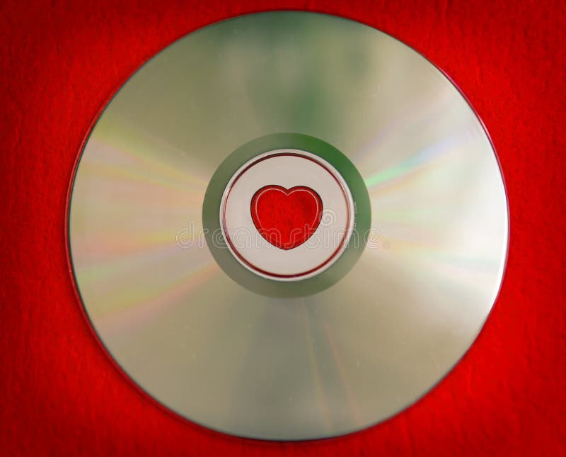 Valentine`s Day Background - Colorful CD Disk with Heart Shape in the ...