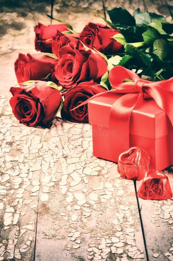Valentine S Setting with Bouquet of Red Roses and Present Stock Image ...