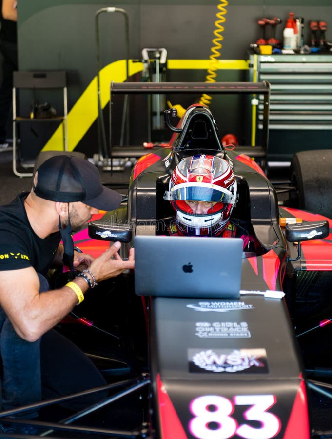 Driver in Monoposto Car Talking with Team Technical Manager with ...