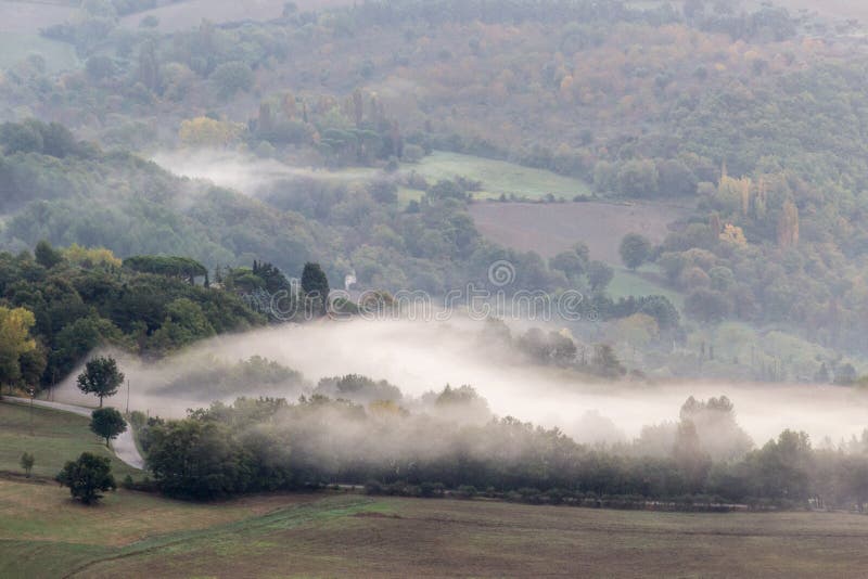 A valley with fog stock image. Image of aerial, natural - 99486685