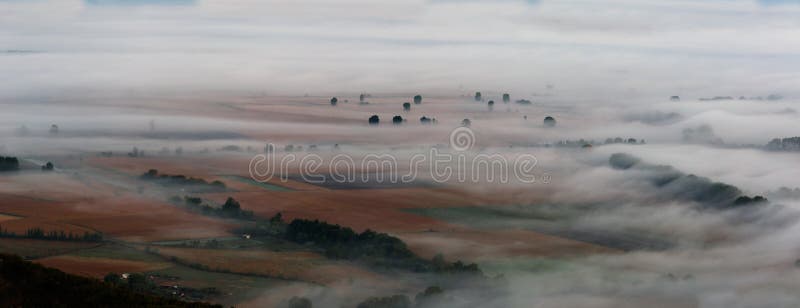 Valley in the mist stock image. Image of mist, fields - 33855515