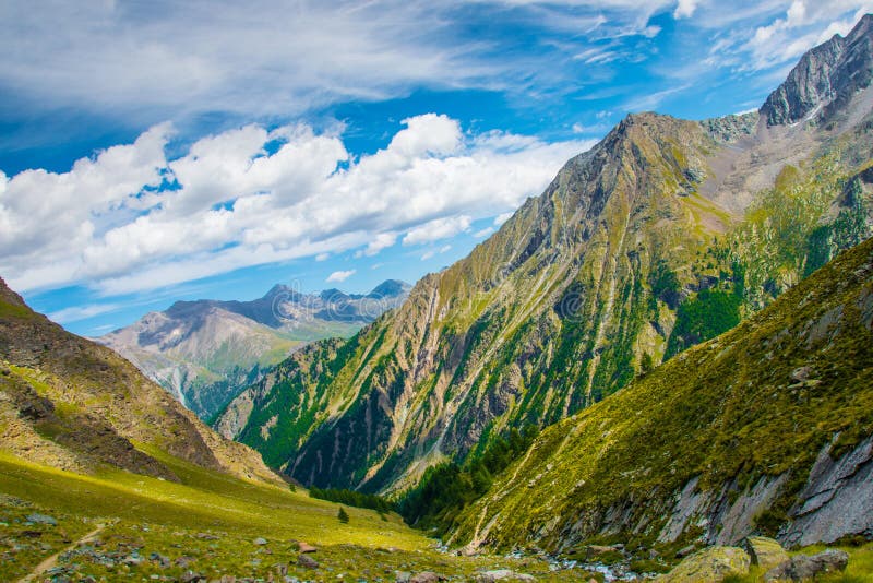 Valley and Sky with clouds stock photo. Image of adventure - 116677842
