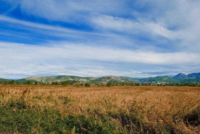 Vally with Crop Fields and Cloudy Blue Sky Stock Photo - Image of ...