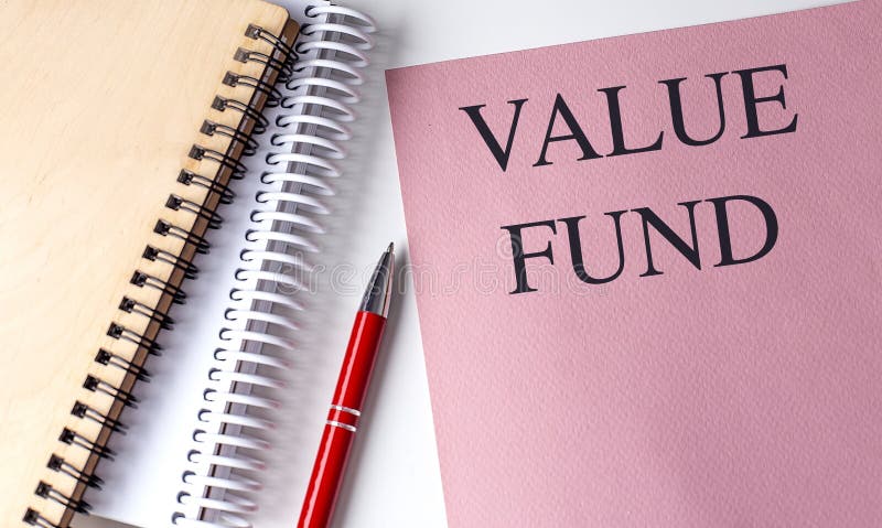 VALUE FUND Text on Pink Paper with Notebooks Stock Image - Image of ...