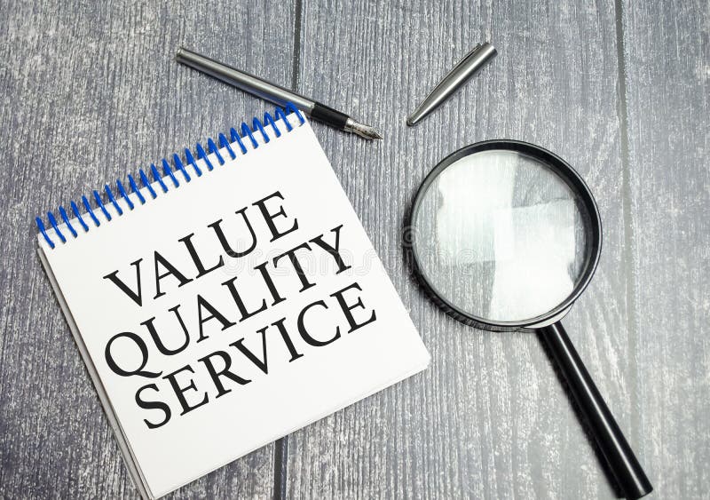 Value Quality Service Symbol on Notepad and Glasses and Magnifying ...