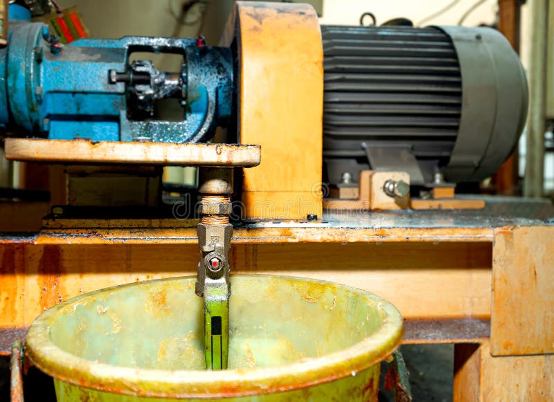 The Valve Draining of Chemical Solution into Container. Stock Photo ...