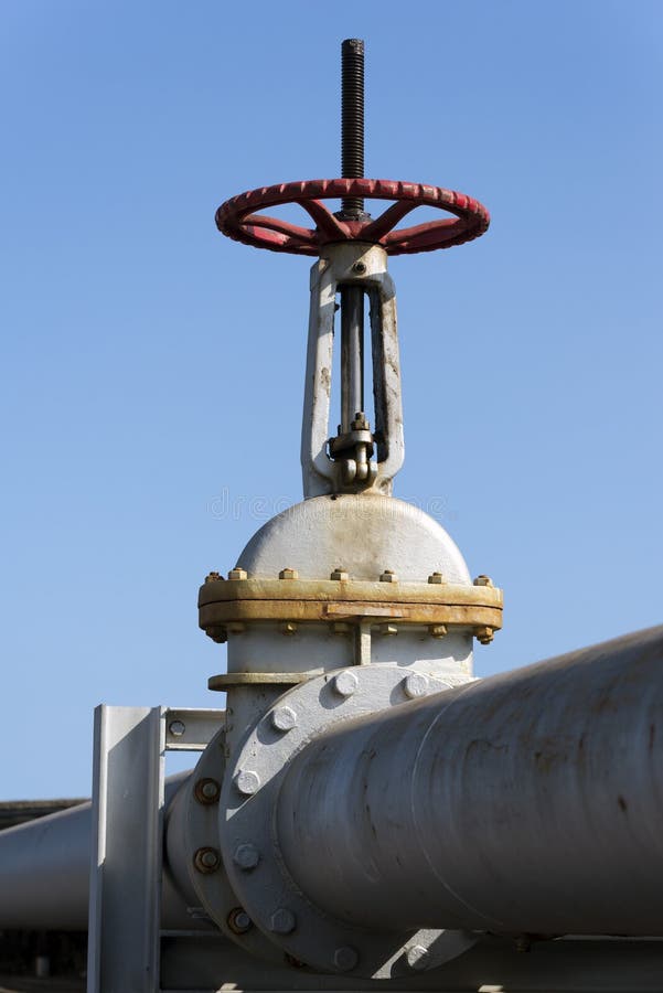 Valve in an oil pipeline stock photo. Image of piping - 100147348