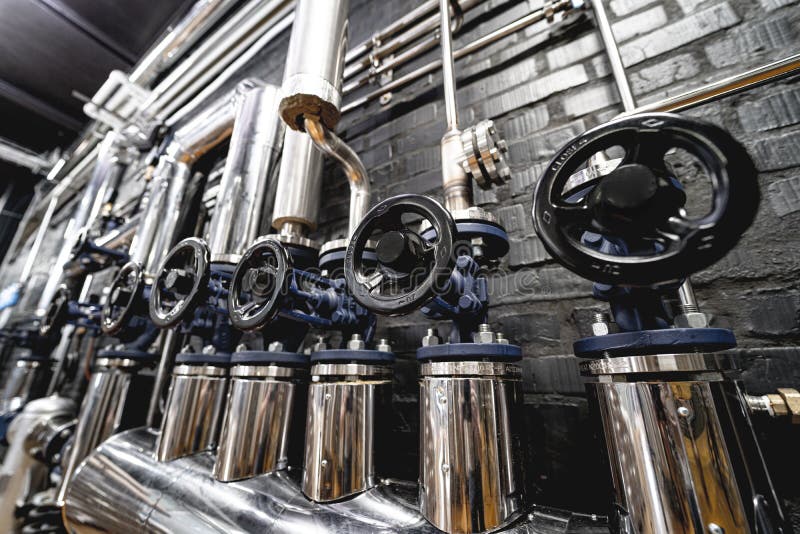 The Valves and Pipes at a Craft Modern Brewery Wall Stock Image - Image ...