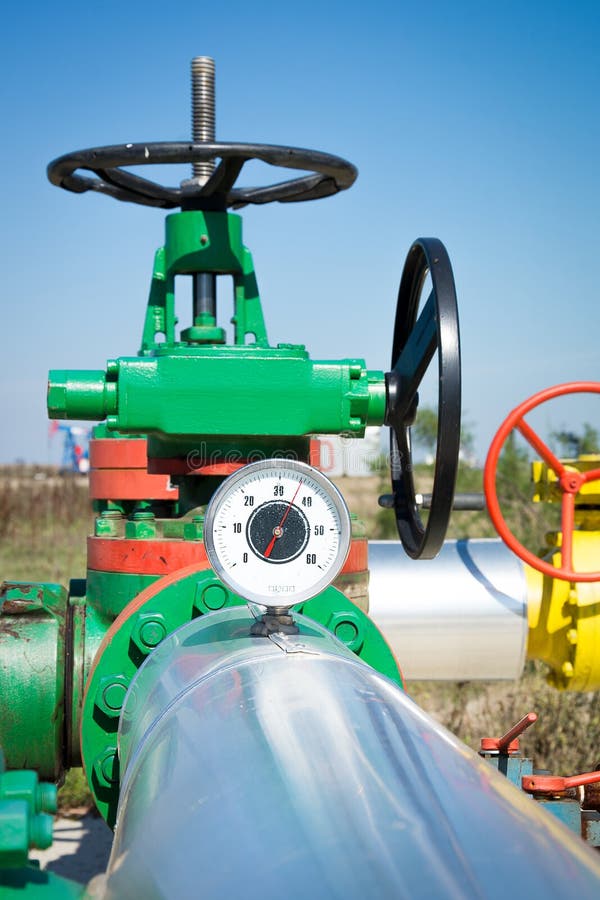 Oil Valves And Piping. Production Wellhead. A Natural Oil Well ...