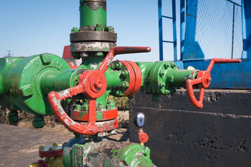 Oil Valves And Piping. Production Wellhead. A Natural Oil Well ...