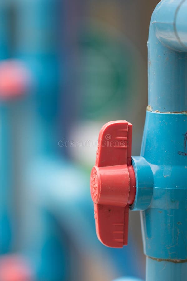 Valves on PVC pipes stock image. Image of watering, manipulation - 44356871