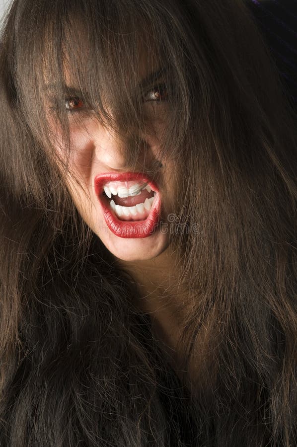 Female Vampire Showing Her Fangs Stock Photo - Image of woman ...