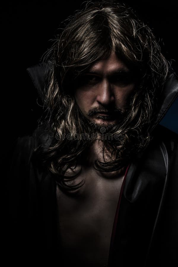 Vampire with Black Coat and Long Hair, Sad Stock Photo - Image of eyes ...