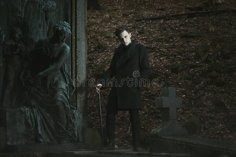 Vampire and Cemetery Statue Stock Image - Image of elegant, door: 195279235