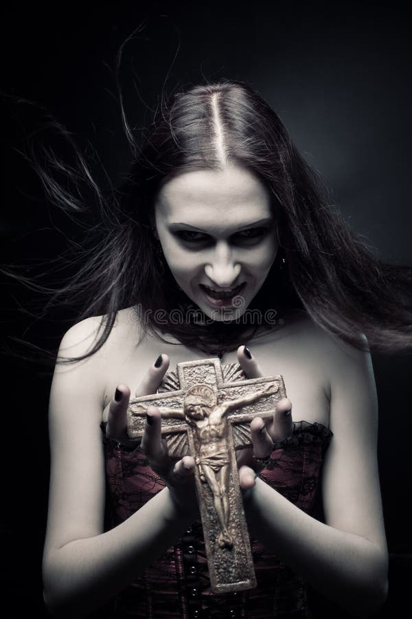 Vampire with crucifix stock image. Image of terrific - 27662513
