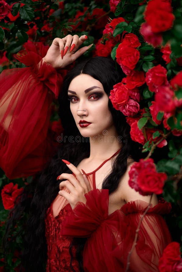 Vampire Girl on a Background of Red Roses Stock Photo - Image of female ...