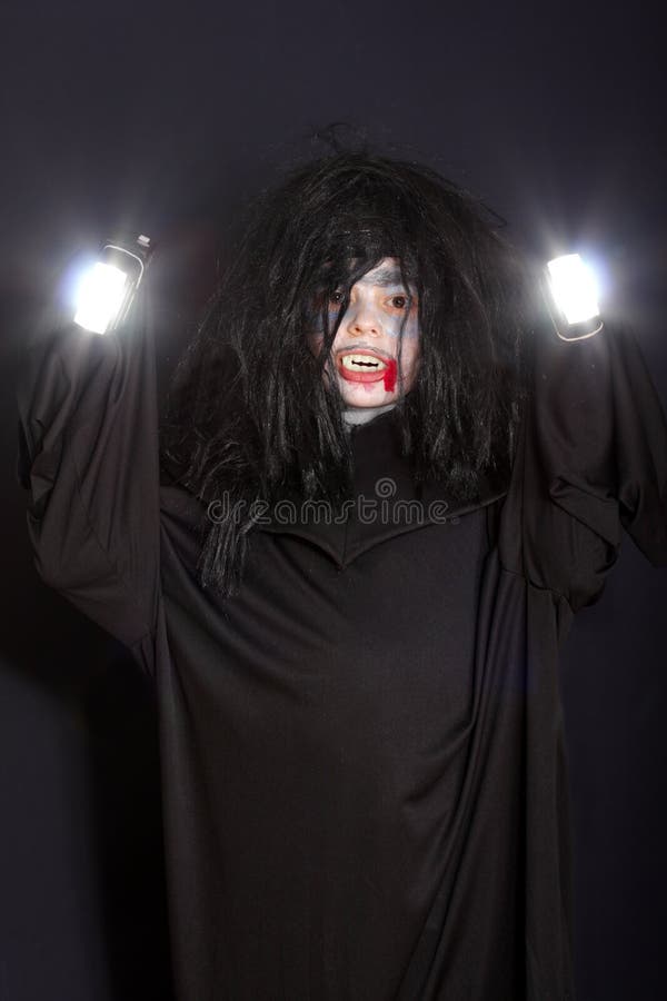 Vampire with light stock image. Image of male, flash - 10909467