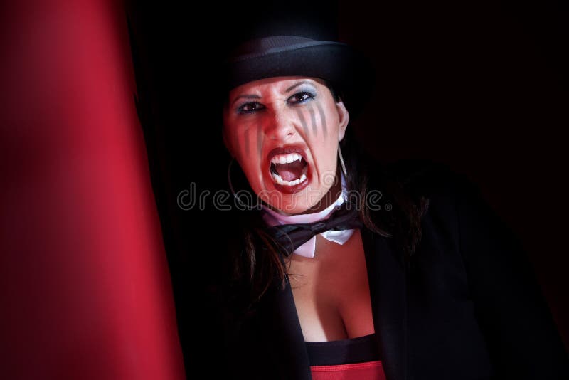 Vampire woman in top hat stock photo. Image of carnies - 17173720