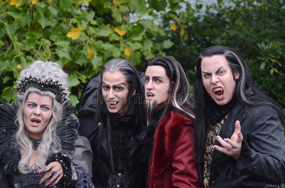 Vampires editorial photo. Image of costumes, bite, cross - 21376531