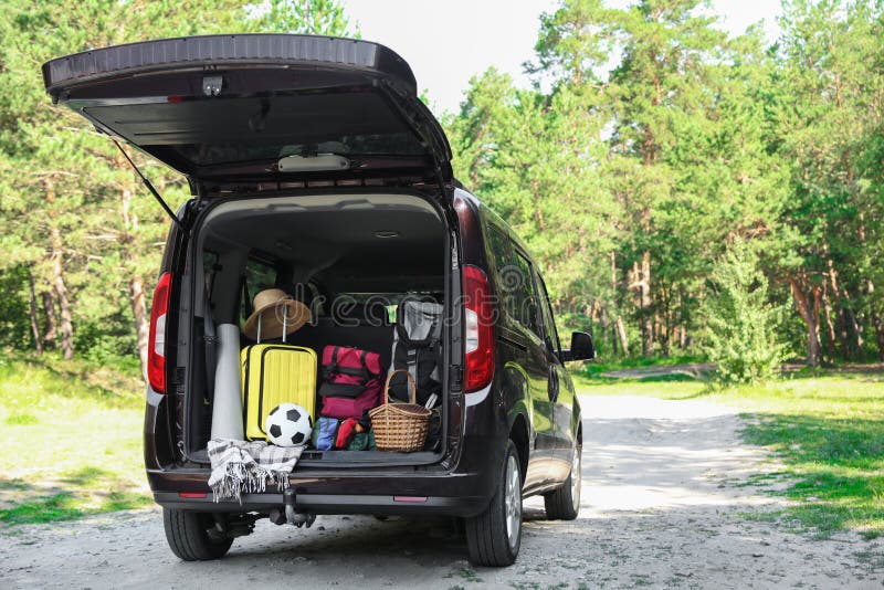 Van with Camping Equipment in Trunk Stock Photo - Image of explore ...