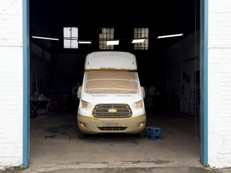 Van in Garage Being Refurbished and Spray Painted Stock Photo - Image ...
