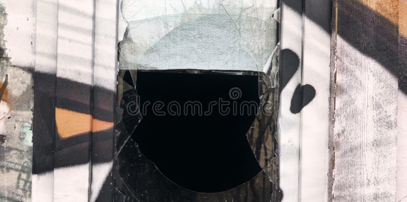 Vandal-smashed Glass and Traces of Graffiti Paint Stock Image - Image ...