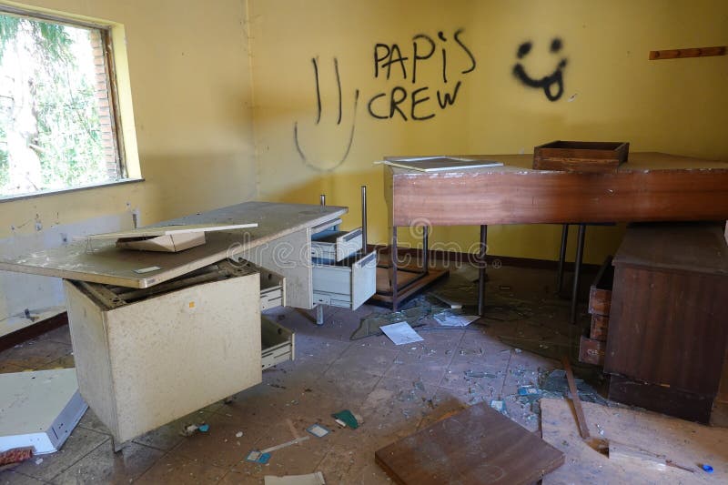 Vandalized Office Room in Abandoned School with Broken Desks Stock ...