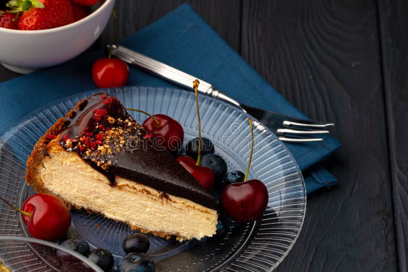 Vanilla Cheesecake with Chocolate Top and Berries Stock Photo - Image ...