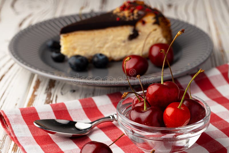 Vanilla Cheesecake with Chocolate Top and Berries Stock Image - Image ...