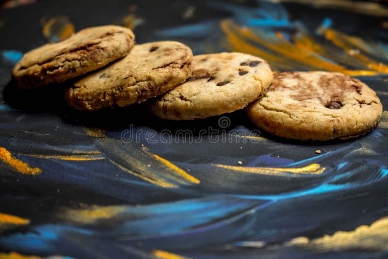 Vanilla Cookies with Chocolate Chips on a Blue and Gold Background ...
