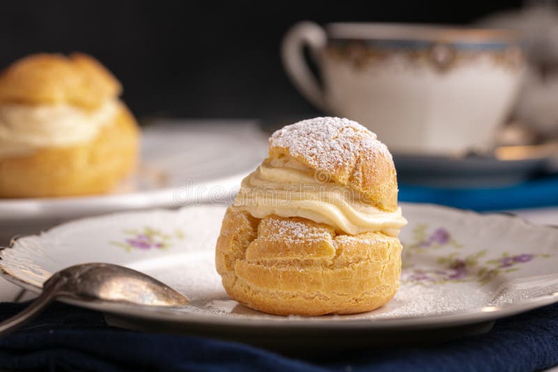 Vanilla Cream Puffs on a Wooden Table Stock Image - Image of yellow ...