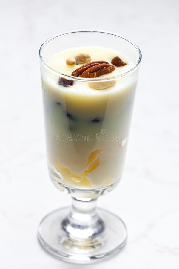 Vanilla Custard with Nuts and Raisins in a Glass Stock Photo - Image of ...